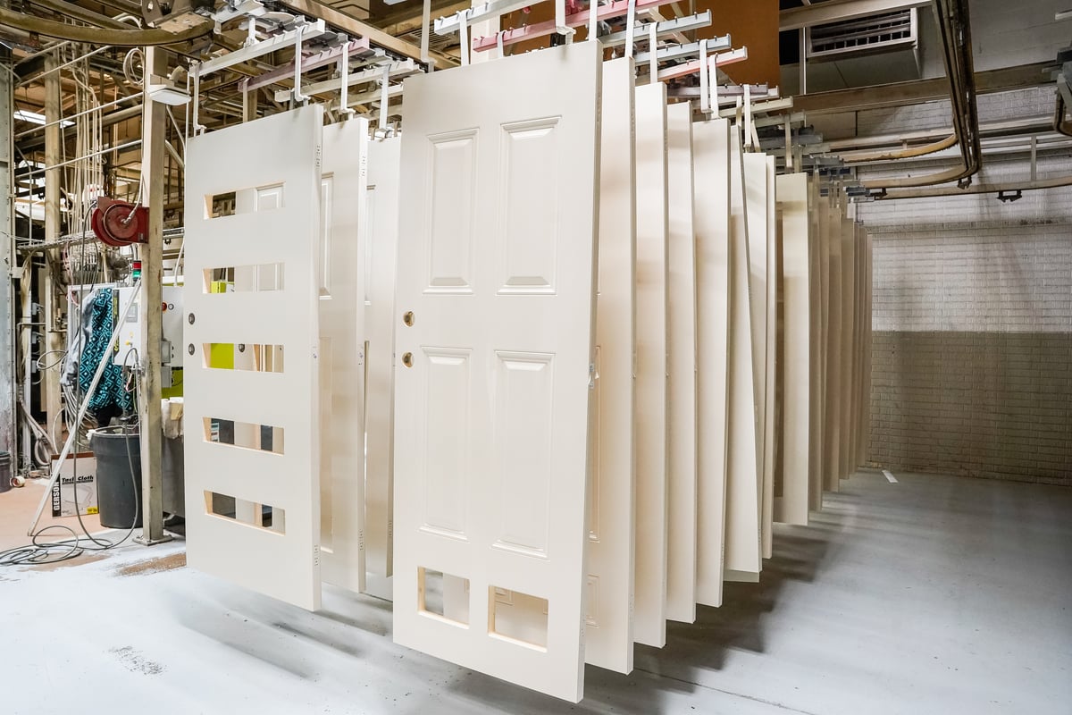 What Causes Entry Doors to Warp, Stick, or Crack? (And When It’s a Problem)